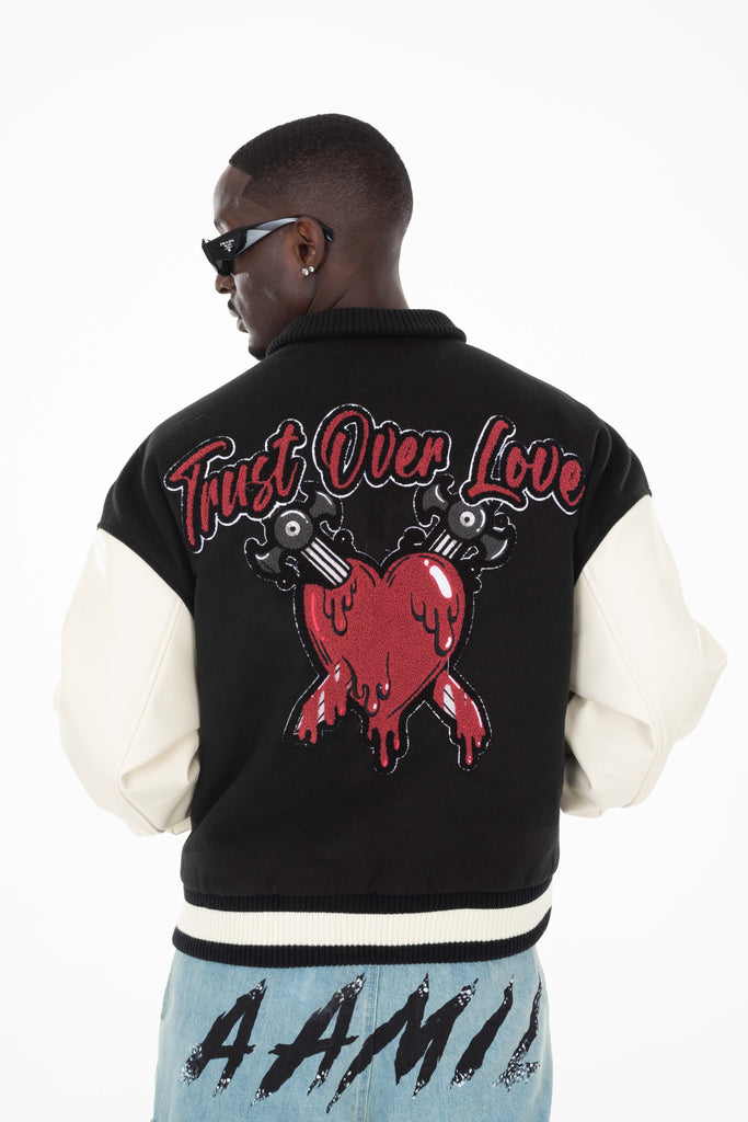 TRUST OVER LOVE BLACK VARSITY JACKET